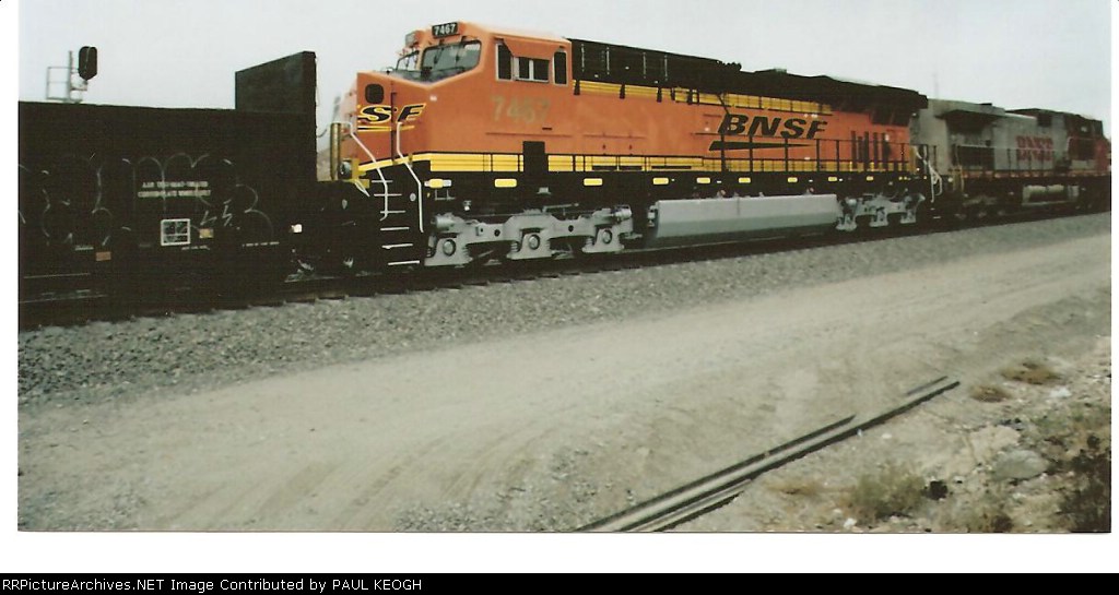 BNSF 7467 passes me as she rolls west towards San Bernadino as a rear DPU.